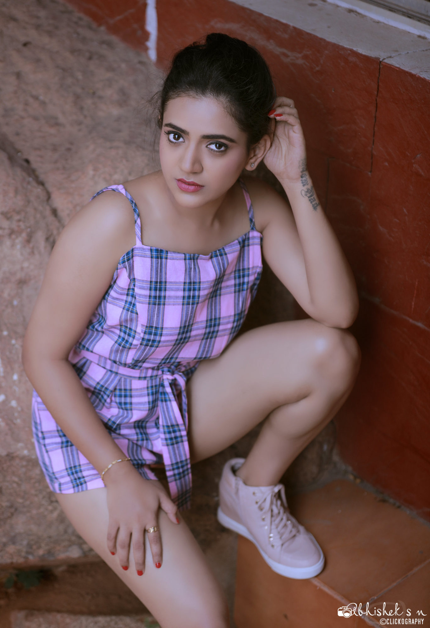 Harshitha Gowda hot stills in pink Playsuit - South Indian Actress