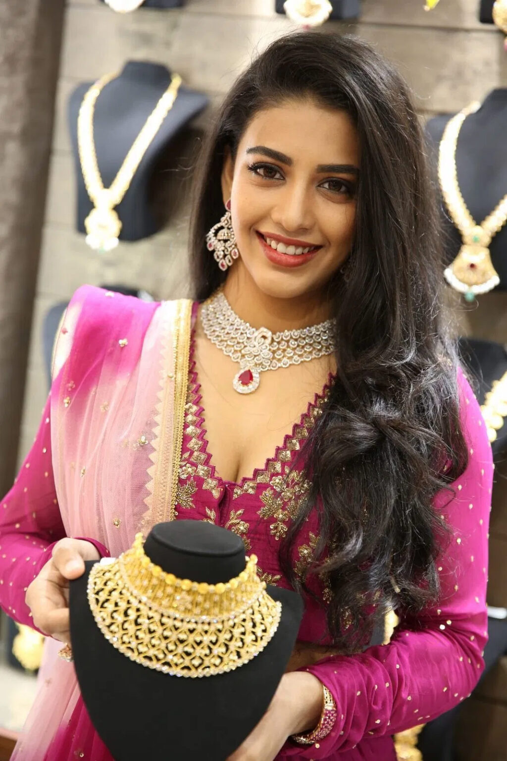 Daksha Nagarkar in pink lehenga stills - South Indian Actress