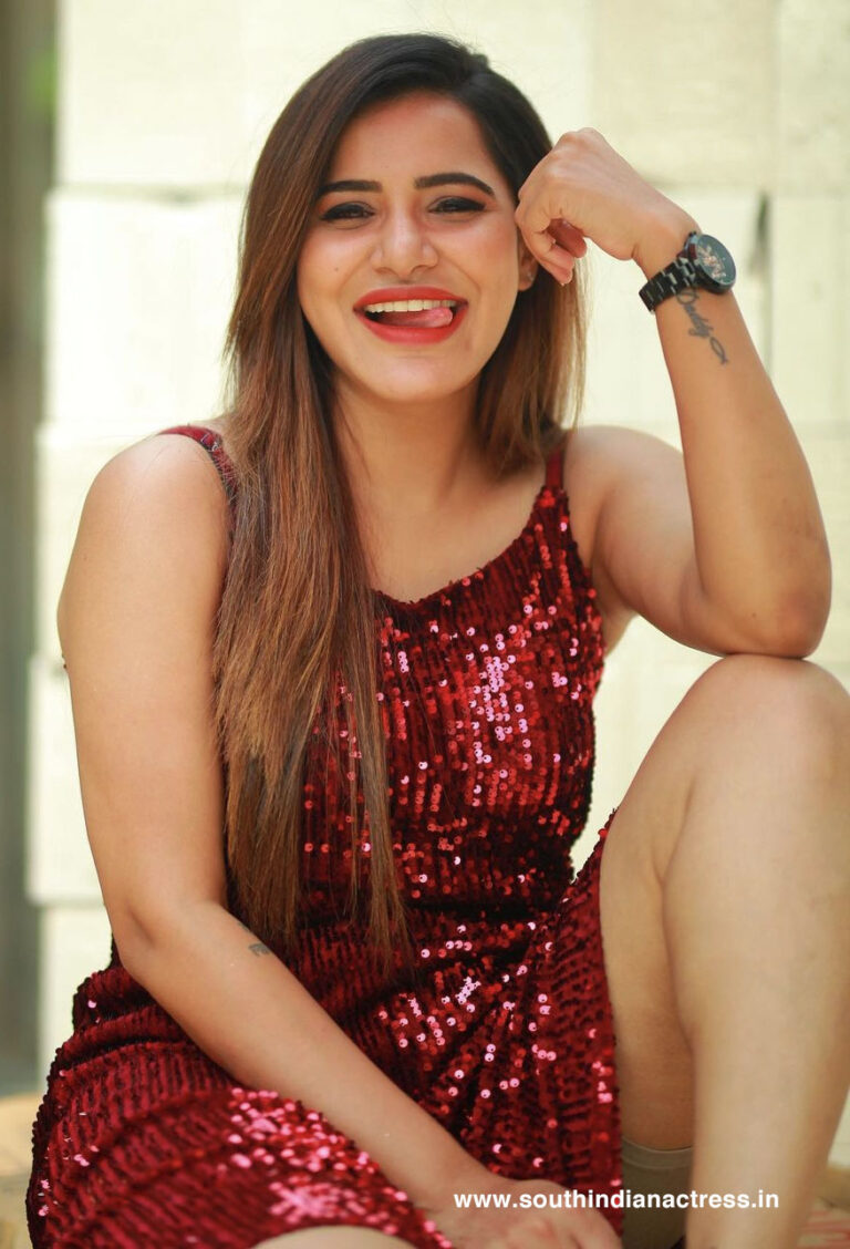 Ashu Reddy hot stills in red sequin short dress - South Indian Actress