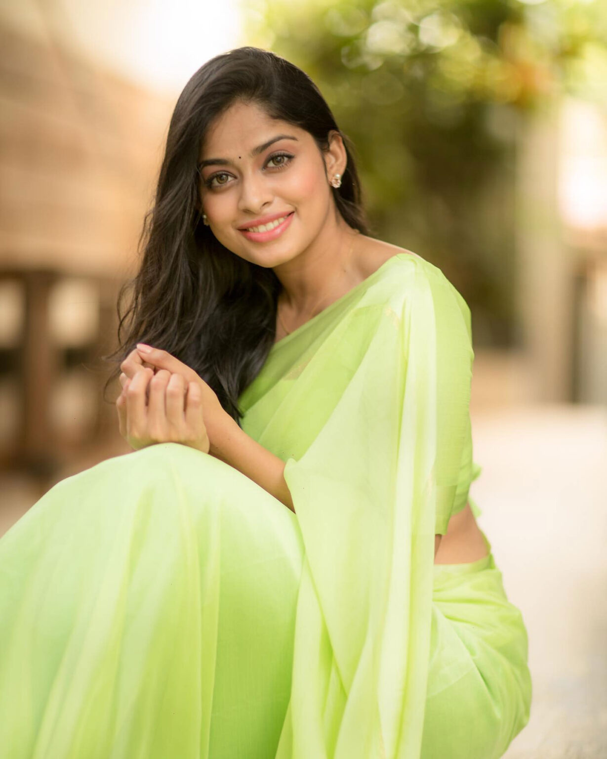 Dharshana Asokan in lime green chiffon saree stills - South Indian Actress