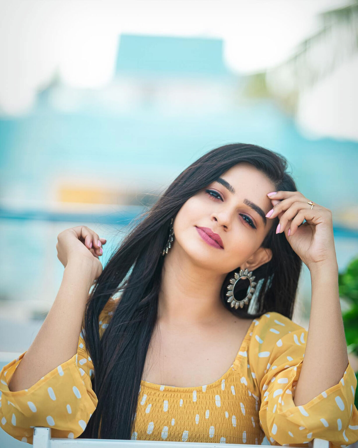 Divya Ganesh in smocked top photoshoot stills - South Indian Actress