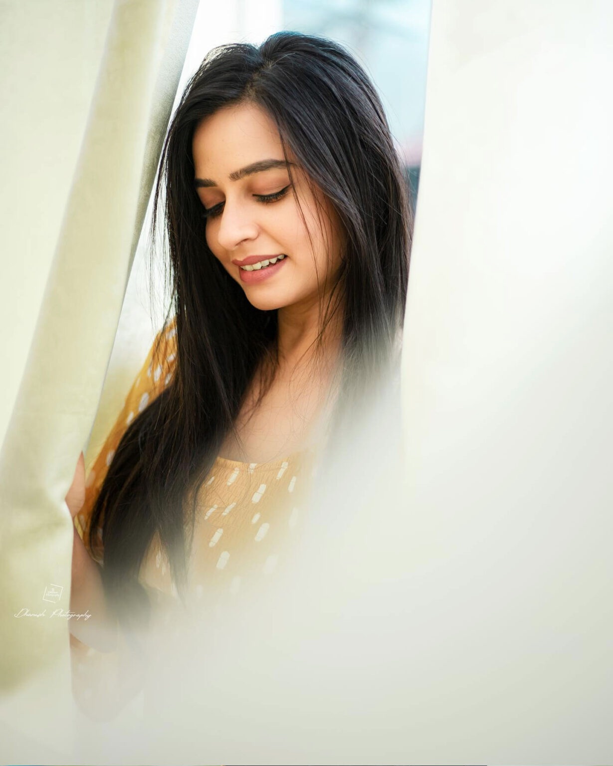 Divya Ganesh in smocked top photoshoot stills - South Indian Actress