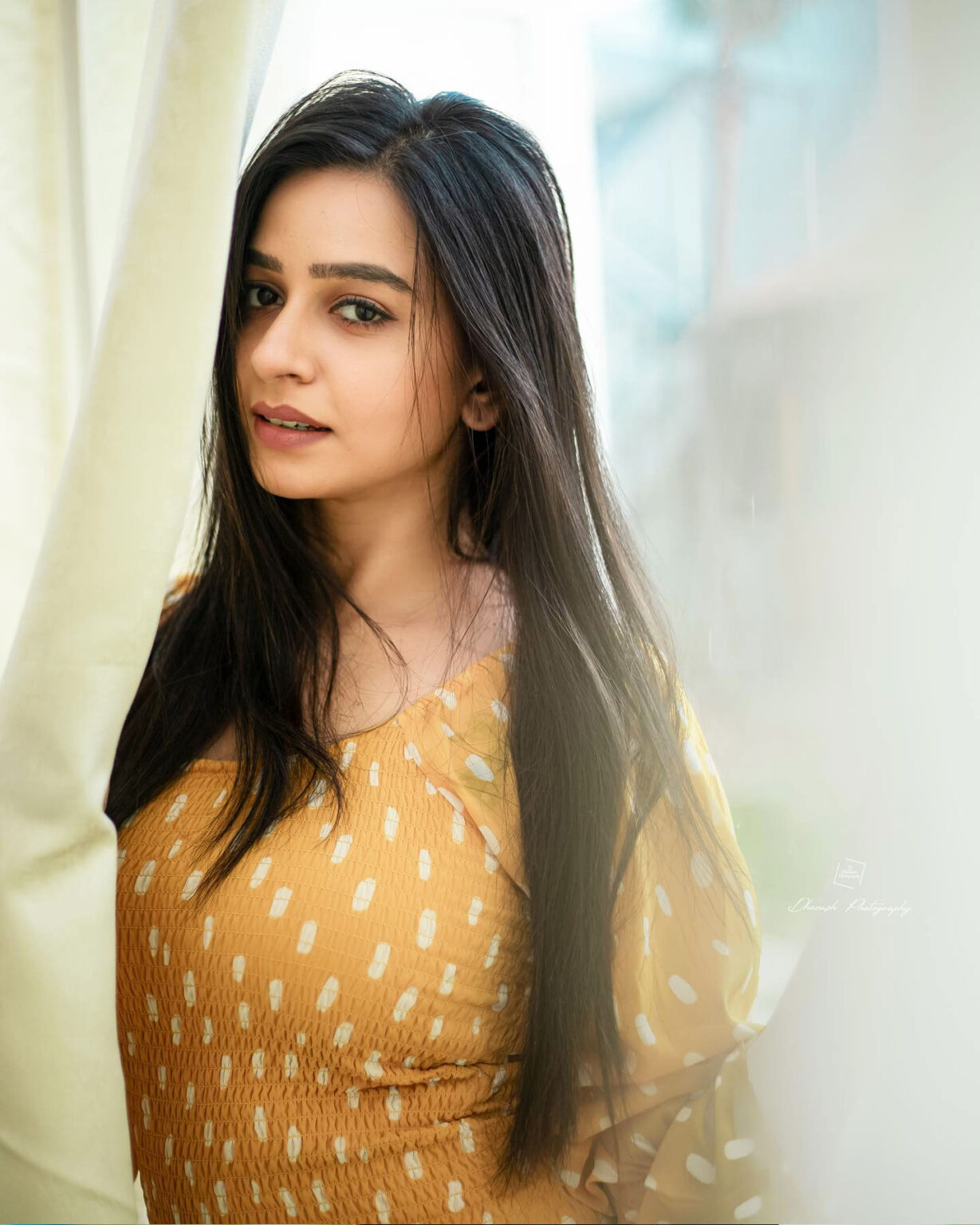 Divya Ganesh in smocked top photoshoot stills - South Indian Actress