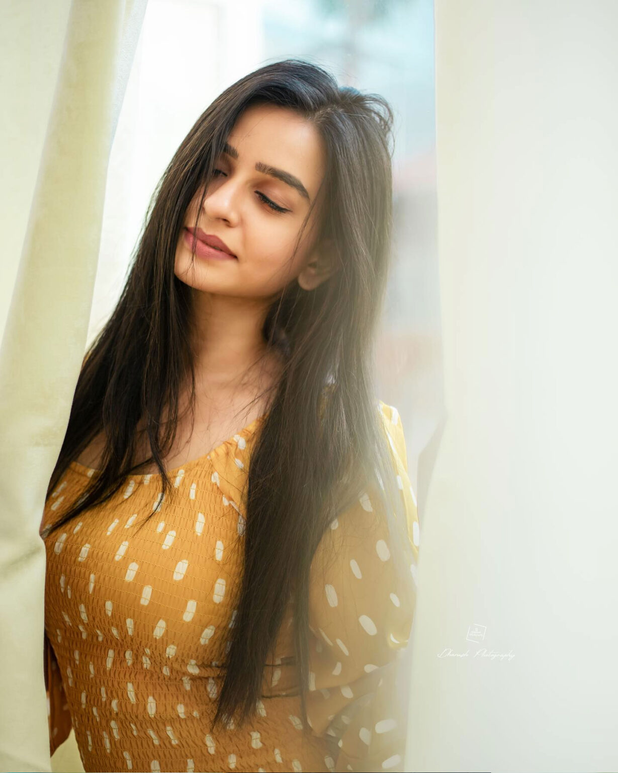 Divya Ganesh in smocked top photoshoot stills - South Indian Actress