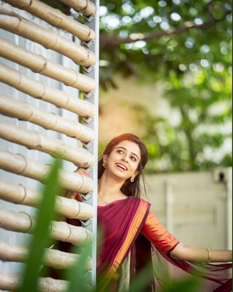 Divya Ganesh in half saree stills - South Indian Actress
