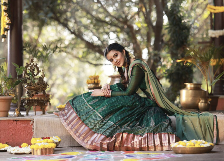 Malvika Sharma in green half saree stills - South Indian Actress