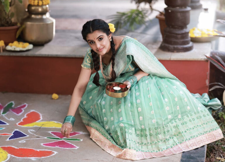 Malvika Sharma in green half saree stills - South Indian Actress