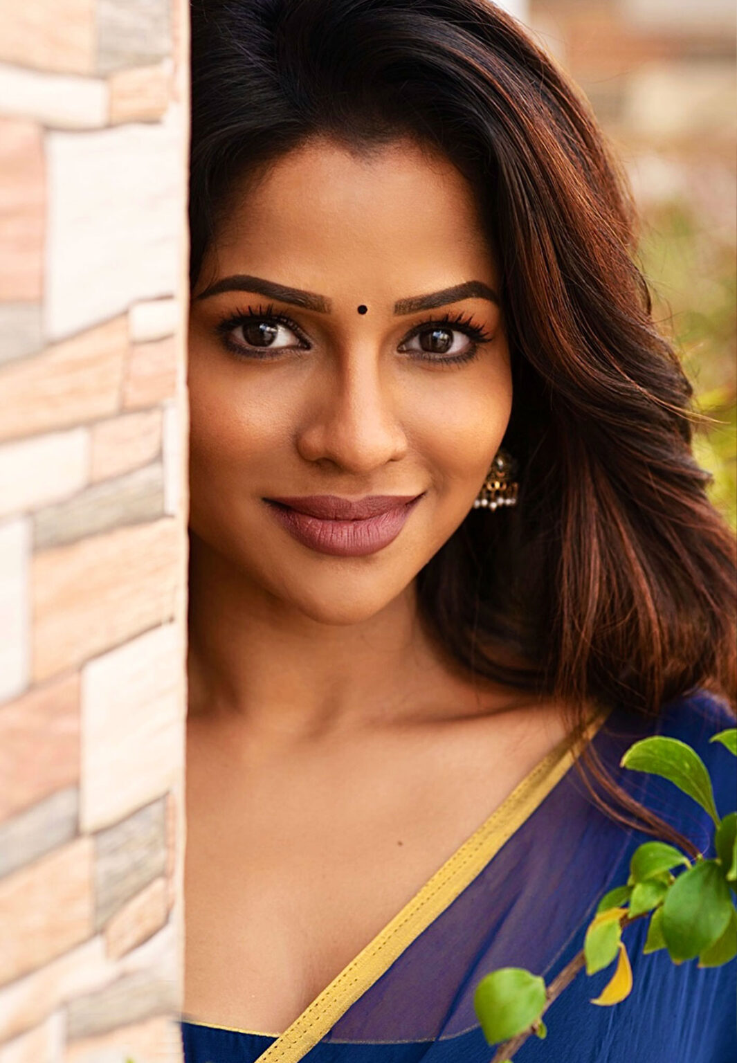 Leesha Eclairs sizzles in blue saree photos - South Indian Actress