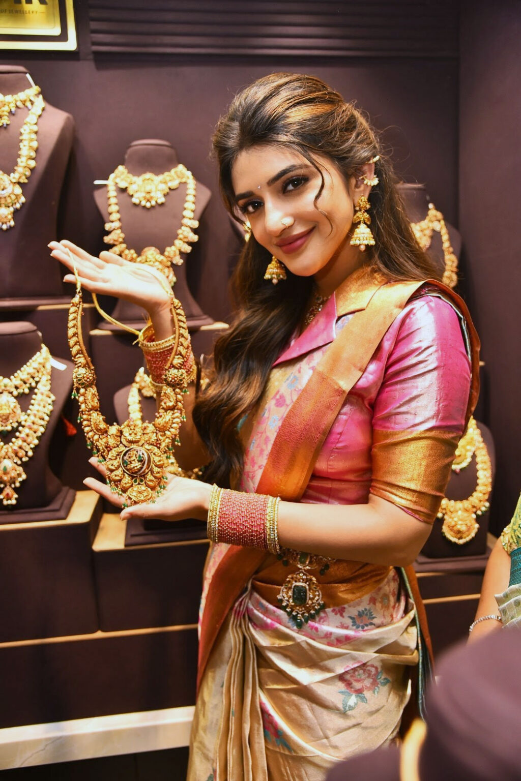 Sreeleela in saree stills at CMR Family Mall launch - South Indian Actress