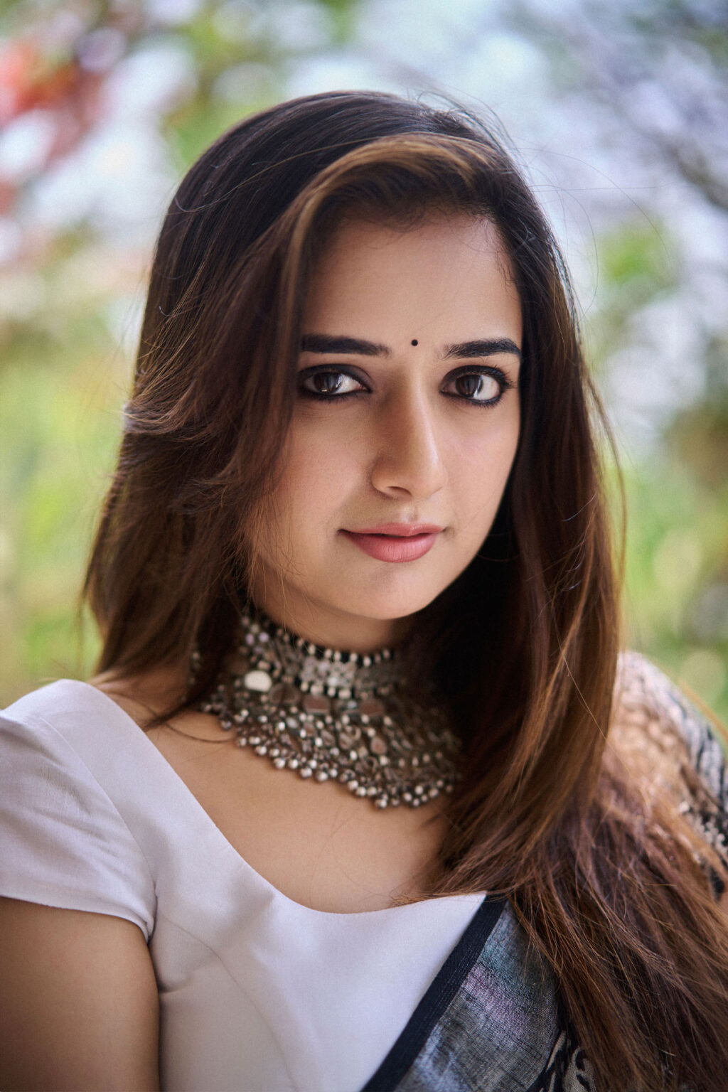 Ashika Ranganath in black saree photoshoot stills - South Indian Actress